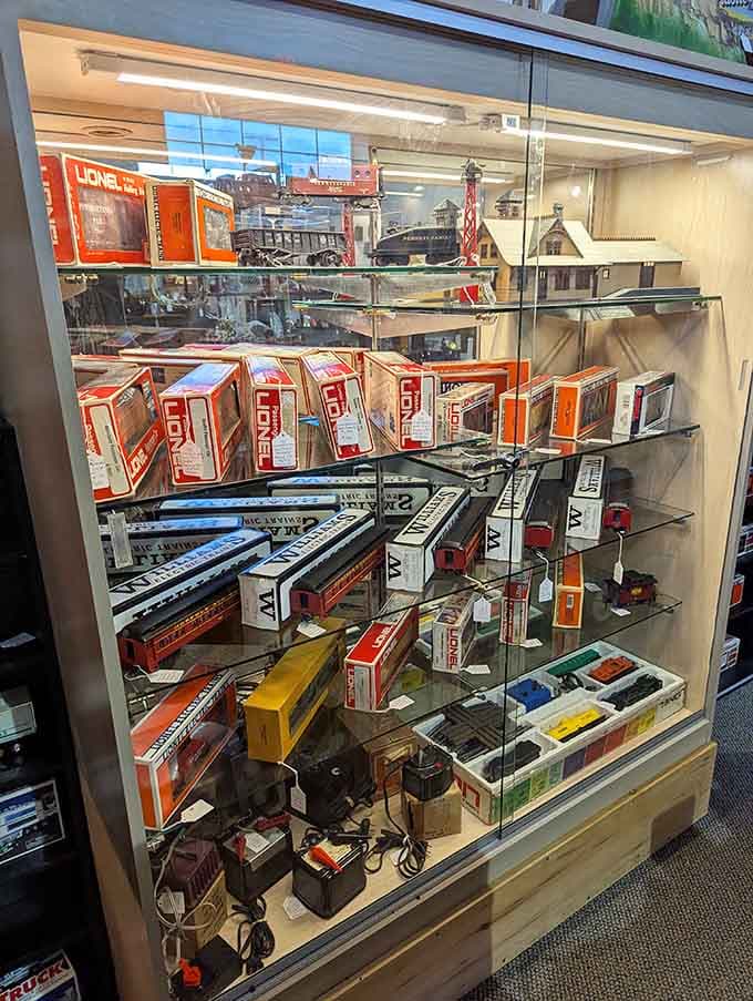 Lionel train sets sit pristine in their boxes, ready to circle Christmas trees like they did in 1955.