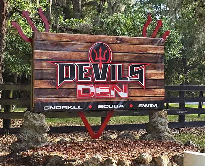 The welcoming sign promises snorkeling, scuba, and swimming in a place that's been perfecting the experience for millions of years.