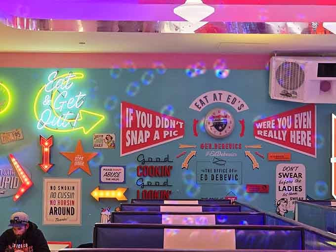 Wall decor so packed with vintage signs and neon, your eyes need a roadmap to take it all in properly.