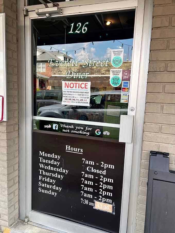 The hours posted on the door show they're serious about breakfast, opening early enough to catch the sunrise crowd daily.