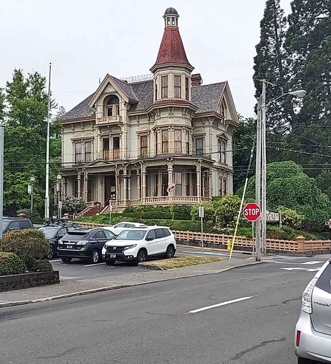The corner lot location means this beauty catches your eye from multiple angles, like it's posing for its own architectural photo shoot.