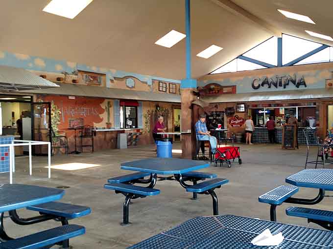 The indoor food court provides welcome respite, where tired shoppers refuel before tackling the next round of treasure hunting.