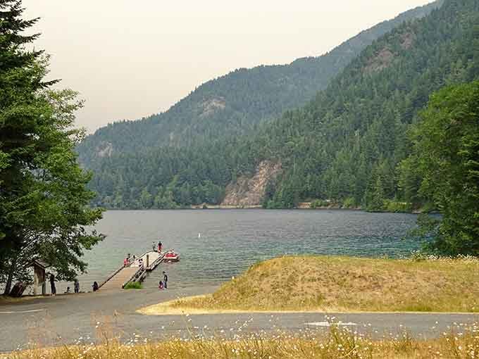 Lake Crescent's dock beckons swimmers and boaters to enjoy waters so clear you'll question if they're real.