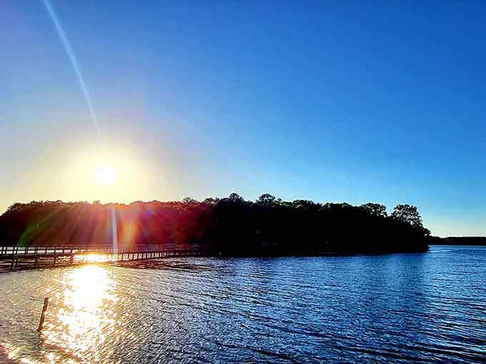 Sunset over the pier creates the kind of golden hour lighting that makes every photo look like professional work.