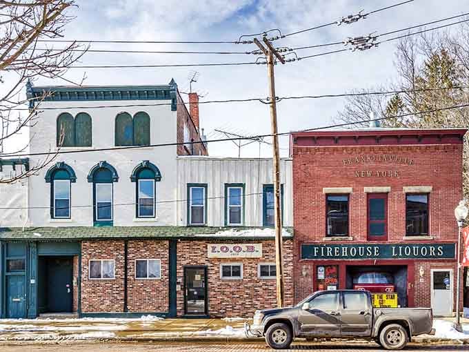 Downtown buildings wearing their age like badges of honor, no apologies for not being shiny and new.