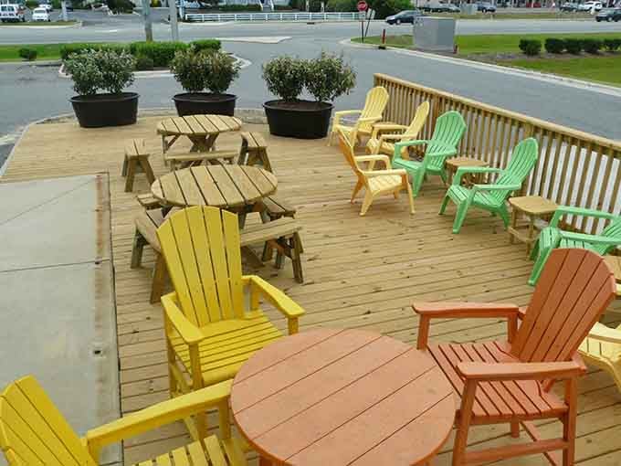 Rainbow Adirondack chairs on the deck offer front-row seats to the best coffee break ever.