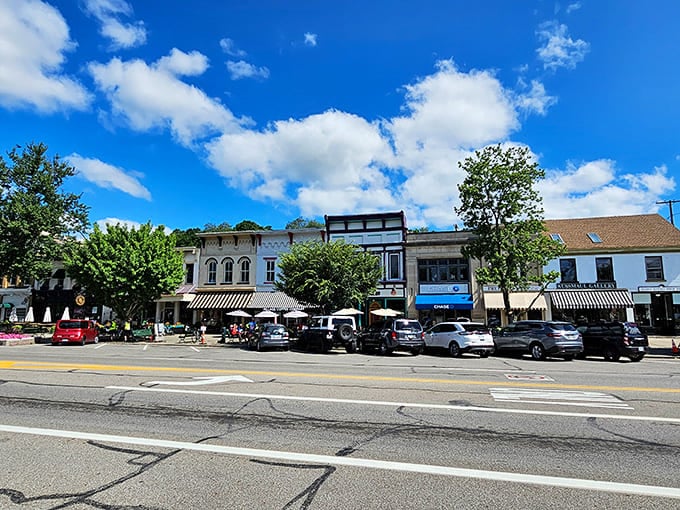 Downtown shops line the street with their varied facades, each storefront competing to be the most photogenic building on your camera roll.