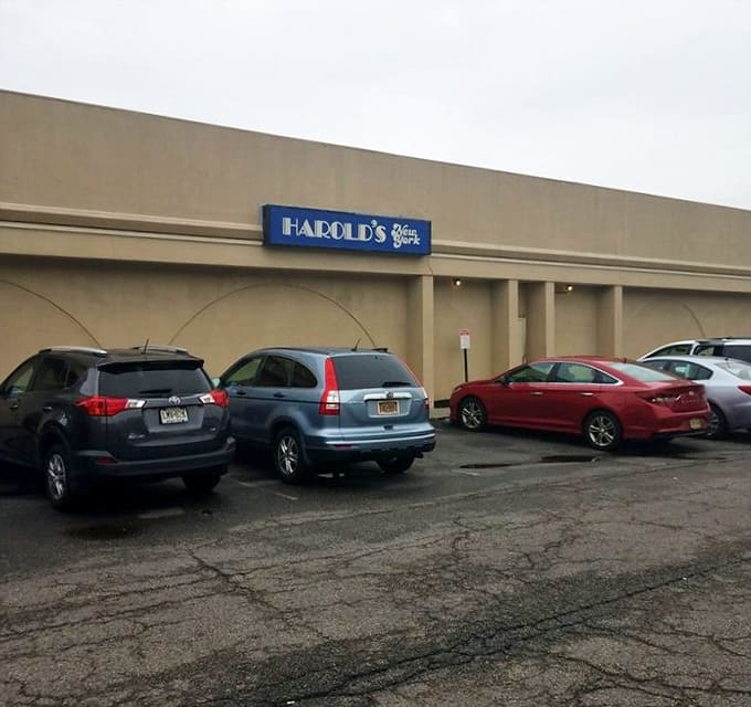The parking lot stays packed because word spreads fast about sandwiches this ridiculously oversized.
