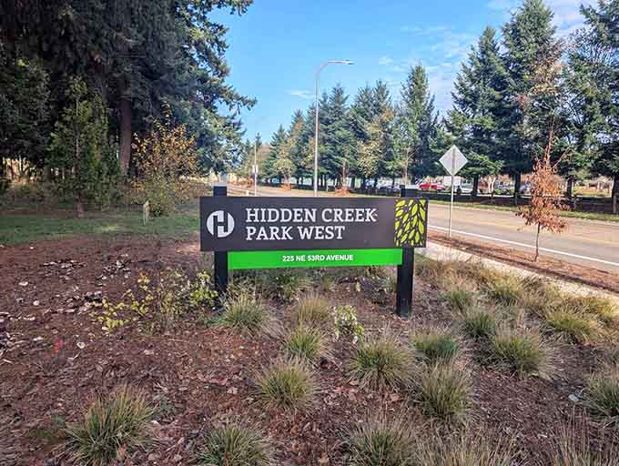 The park signage welcomes visitors with clear directions, proving that good wayfinding makes everyone's day easier instantly.