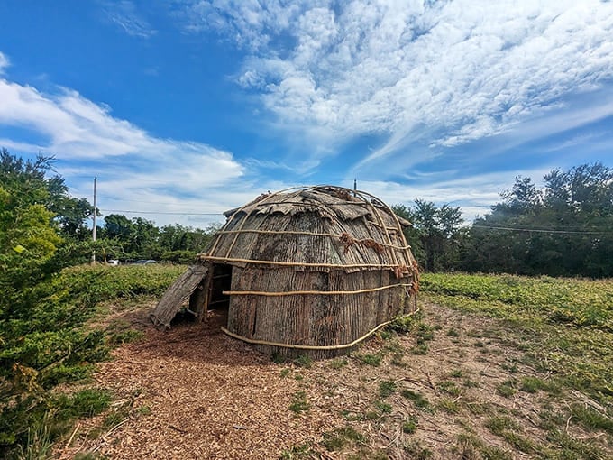 A traditional wetu structure near the grounds honors the indigenous peoples who knew this land long before lighthouses.