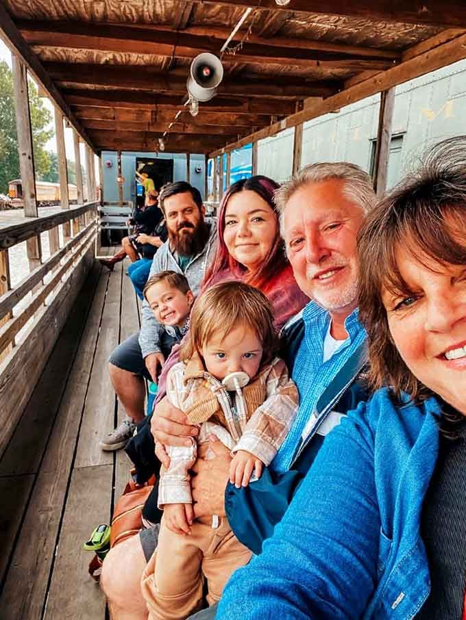 Multi-generational families create memories aboard the open-air cars, proving that train travel's magic transcends age in our digital world.