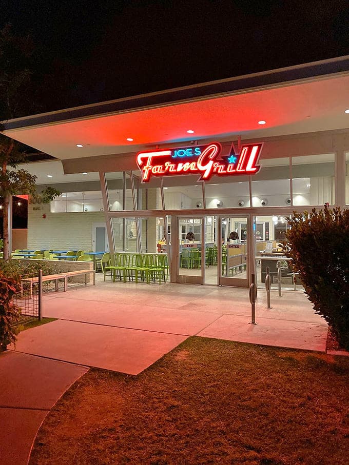 The entrance glows like a beacon calling you home after a long day of questionable decisions.