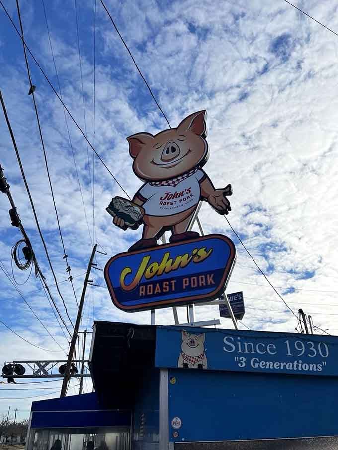 That cheerful pig mascot has been watching over sandwich pilgrims since the Depression era, still smiling today.