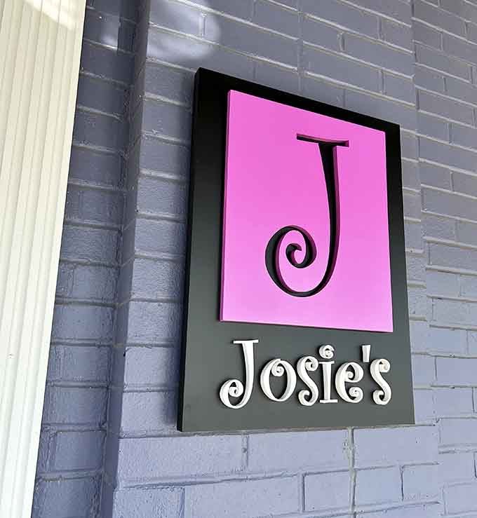 That playful pink sign with its whimsical lettering tells you immediately that Josie's doesn't take itself too seriously.