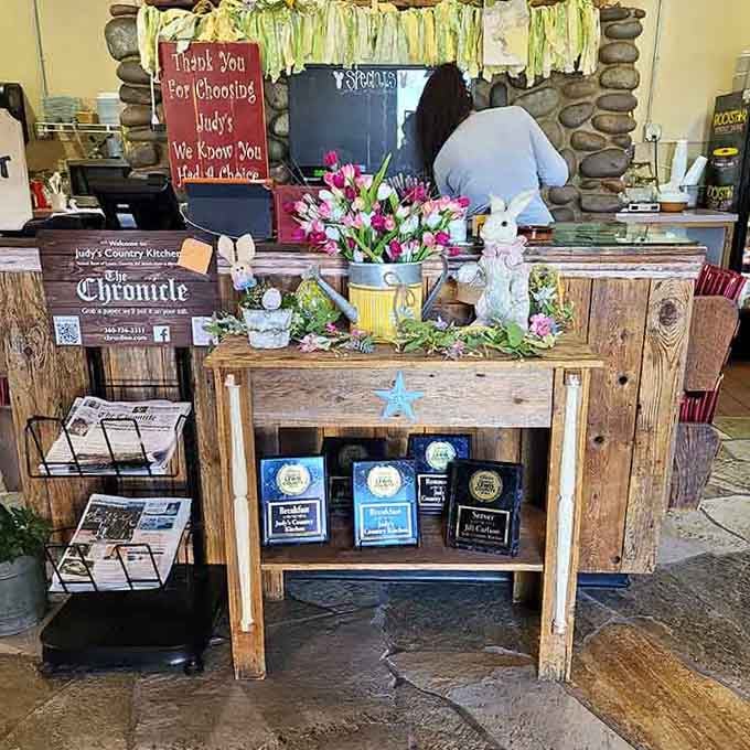 Fresh flowers and local newspapers at the counter, because some traditions are worth keeping in our digital age of everything.