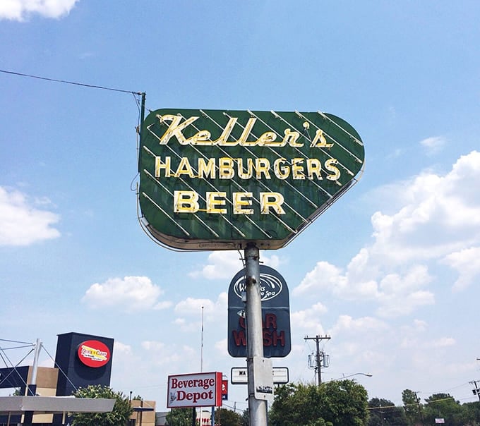 That vintage neon sign pointing the way to burger bliss, a beacon for anyone who appreciates the good stuff.