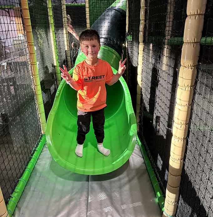 Tube slides wind through the structure like colorful intestines, which sounds weird but kids absolutely love.