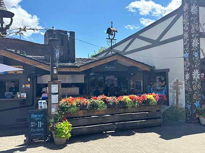 Flower boxes overflow with blooms, adding splashes of color to buildings that already look impossibly picturesque.