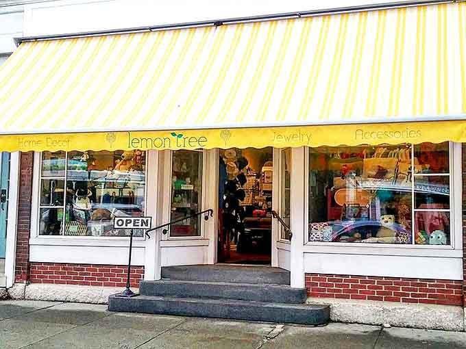 Lemon Tree Gifts' cheerful yellow awning promises treasures within. The kind of shop where you enter for "just a minute" and emerge an hour later.
