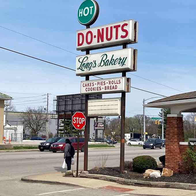 The classic roadside beacon promising hot donuts, cakes, pies, and rolls, basically everything your cardiologist warns you about lovingly.