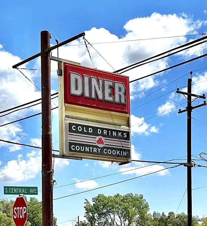 This roadside sign announcing "Country Cookin'" doesn't lie, exaggerate, or need to explain itself to anyone passing by.