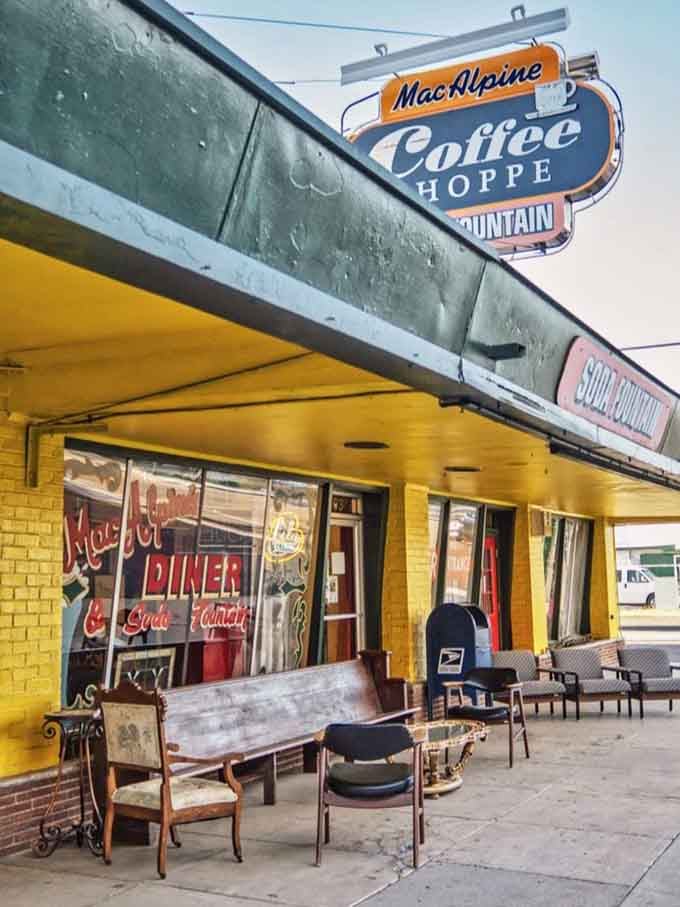 The cheerful yellow exterior and vintage signage make this corner spot impossible to miss or resist visiting soon.