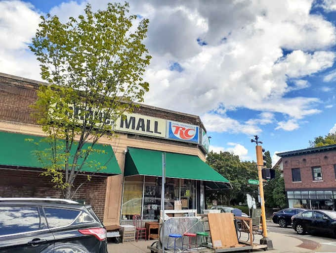 The corner building stands proud against dramatic clouds, a neighborhood landmark where the past isn't just remembered but actually for sale.