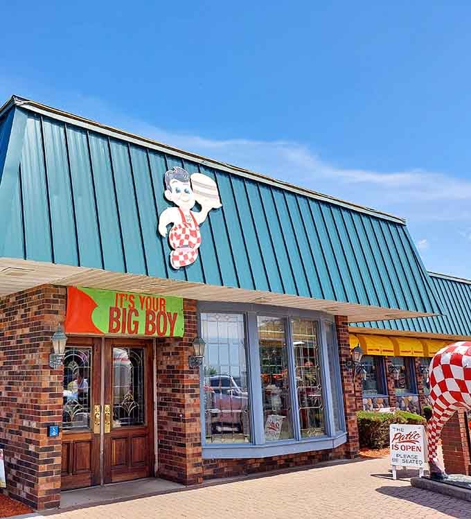 Big Boy's checkered charm welcomes hungry travelers, a familiar friend in unfamiliar territory serving comfort by the plateful.