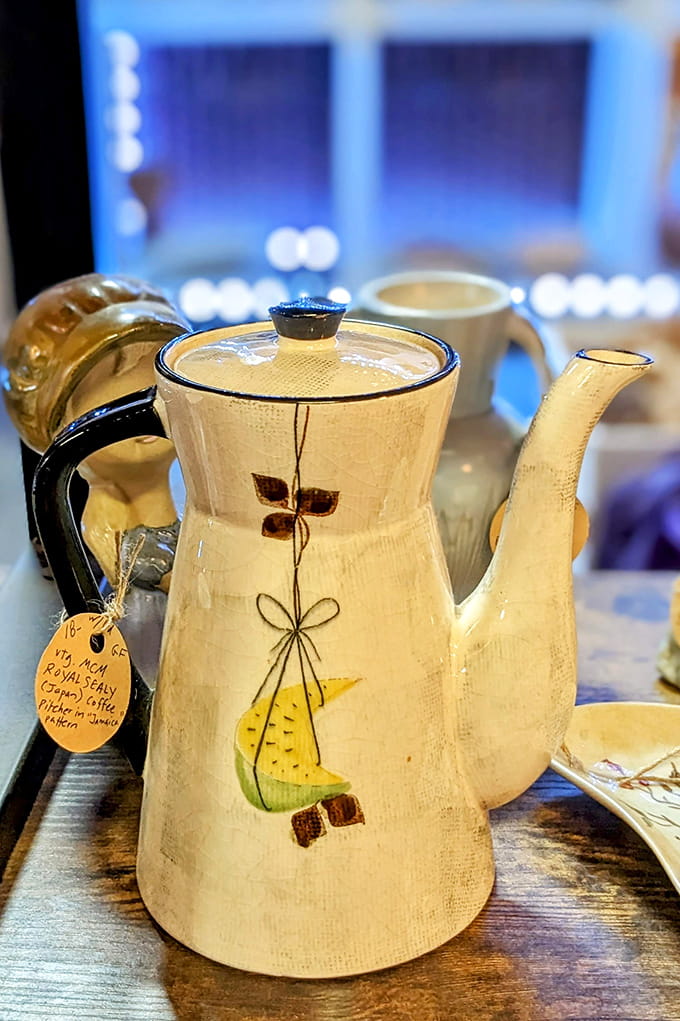 This charming teapot with its hand-painted pear design represents the craftsmanship modern mass production forgot.