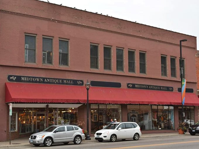 The brick facade of Midtown Antique Mall, anchoring downtown Stillwater with vintage charm and endless possibilities.