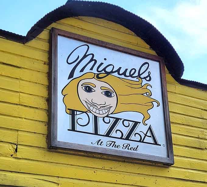 That smiling sun logo perfectly captures the warm welcome waiting inside this yellow haven.