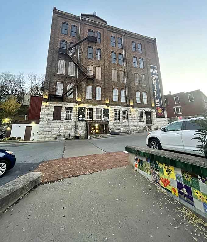 The parking area and exterior by day, when the building looks slightly less magical but equally ready to serve.