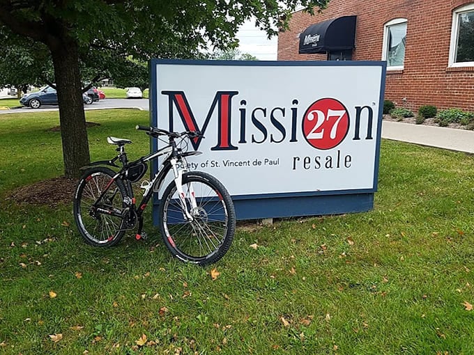 The Mission 27 Resale sign welcomes treasure hunters to Indianapolis's best-kept thrift shopping secret on Leota Street.