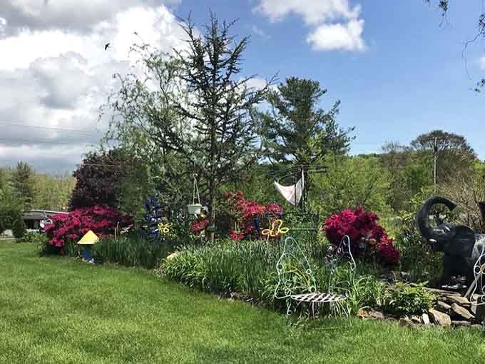 The landscaped grounds feature elephant statues among the flowers, extending the collection outdoors into the Pennsylvania countryside.