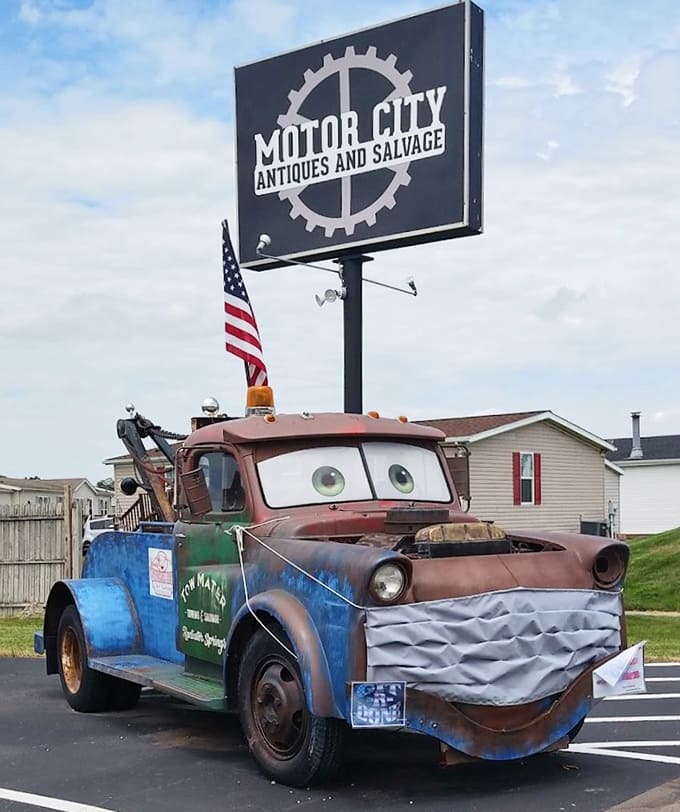 That vintage tow truck mascot outside isn't just decoration; it's a promise of the automotive nostalgia within.