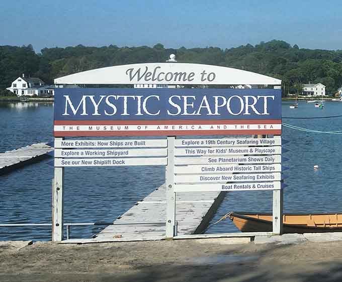 The waterfront welcome sign lists adventures awaiting beyond, from historic ships to planetarium shows that'll fill your entire day.
