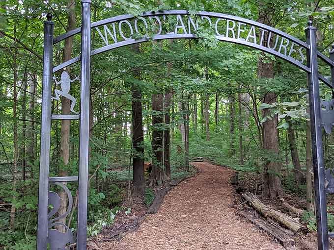 The woodland trail entrance beckons nature lovers into a peaceful escape where the only notifications you'll receive come from chirping birds overhead.