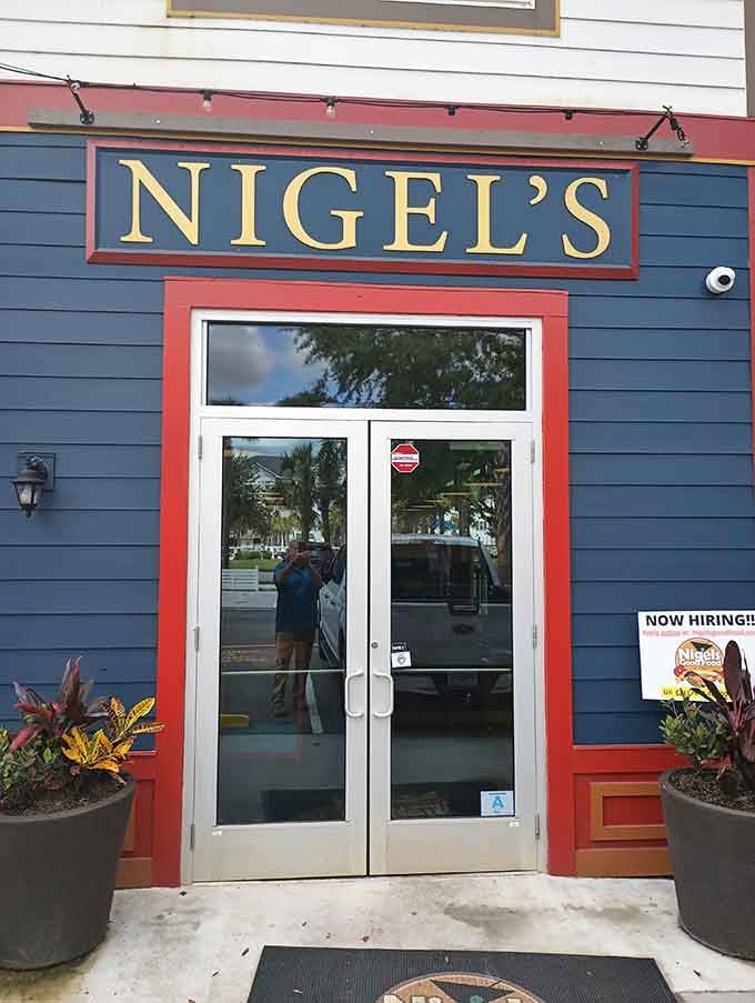 The front entrance framed by potted plants welcomes you like an old friend who's about to feed you well.
