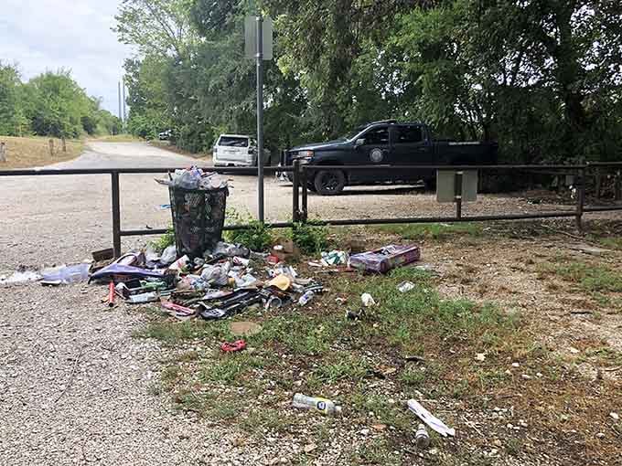The parking area shows this hidden gem attracts plenty of curious visitors seeking their own supernatural adventures.