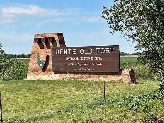 The official National Historic Site marker confirms this isn't just any old fort, it's a nationally recognized treasure of American frontier history.