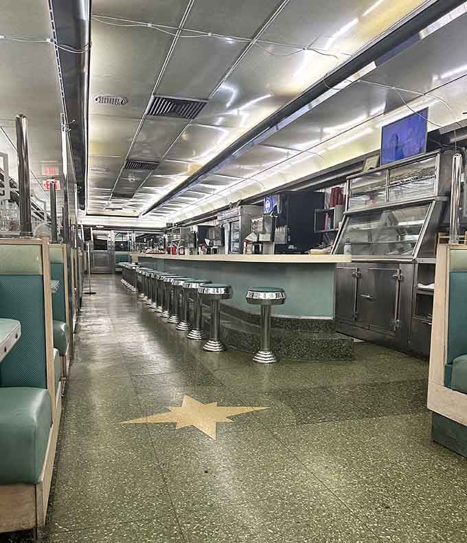 Looking down that impossibly long counter, you understand why they call it the longest stainless steel diner in America.