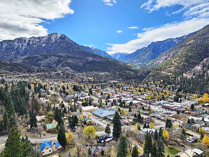 From above, Ouray reveals its box canyon secret, a town perfectly nestled where mountains meet in dramatic fashion.