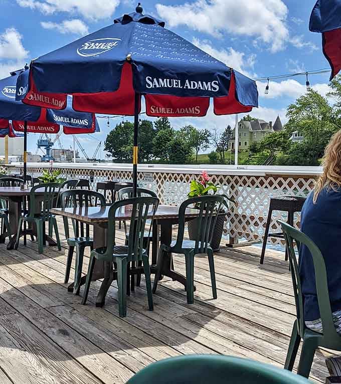 Outdoor dining with a view that reminds you why people write poetry about Maine. Those Samuel Adams umbrellas aren't just providing shade&mdash;they're framing postcard-worthy moments.