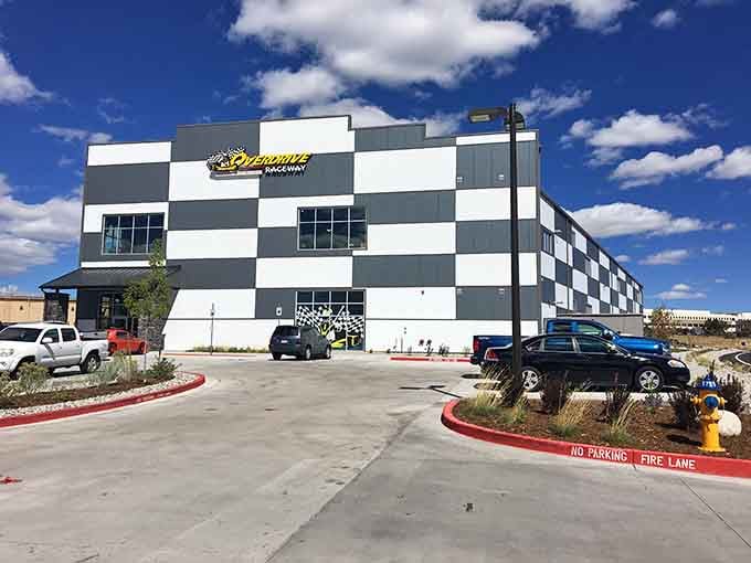 That checkered flag exterior announces speed from the parking lot, visible to anyone doubting Colorado Springs' racing credentials.