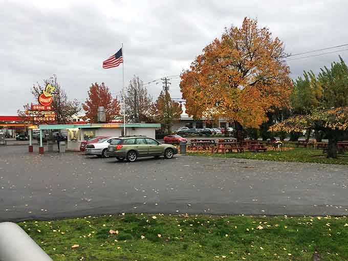 Autumn leaves frame this timeless scene where classic American drive-in culture still thrives against all modern odds.