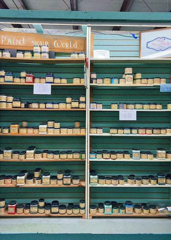 Rows of specialty paints invite DIY enthusiasts to transform their vintage finds into personalized masterpieces.