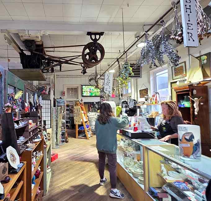 The checkout counter where friendly faces help tally your treasures, proving great deals come with even better customer service.