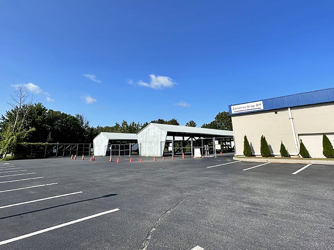 A spacious parking lot awaits the weekend rush, when savvy shoppers arrive early, caffeinated and ready for the thrill of the hunt.