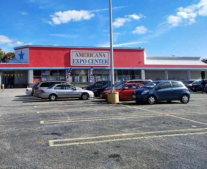 Parking lot where treasure seekers gather, each car representing a different quest. The calm before the bargain-hunting storm.