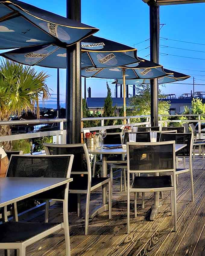 The outdoor deck where time slows down, conversations flow easier, and somehow food tastes even better under Florida's endless blue sky.